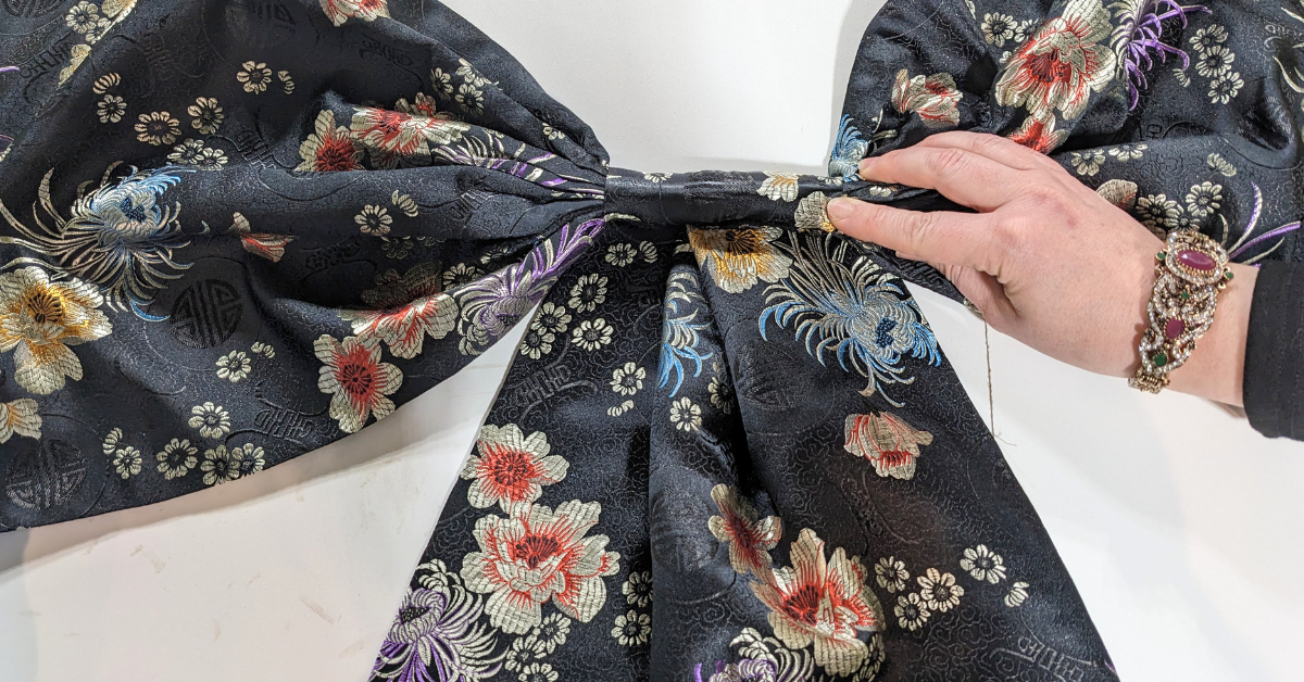 How We Created a Black Floral Asian Bow for a Bride’s White Gown – Tad ...